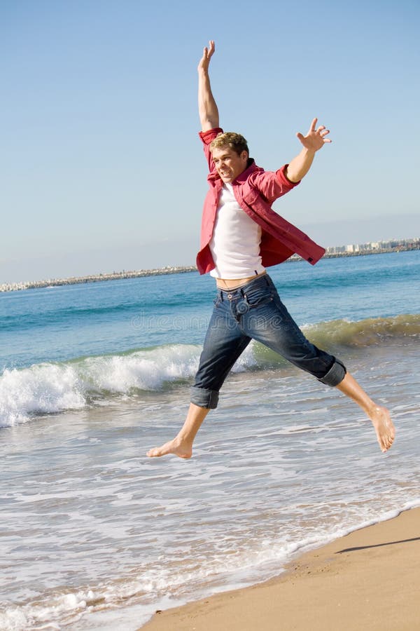Beach jump stock photo. Image of four, games, joyful - 10972442
