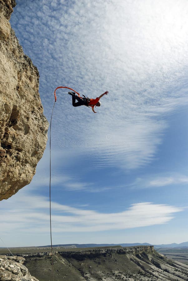Jump off the cliff. stock image. Image of freedom, bungee - 74371691