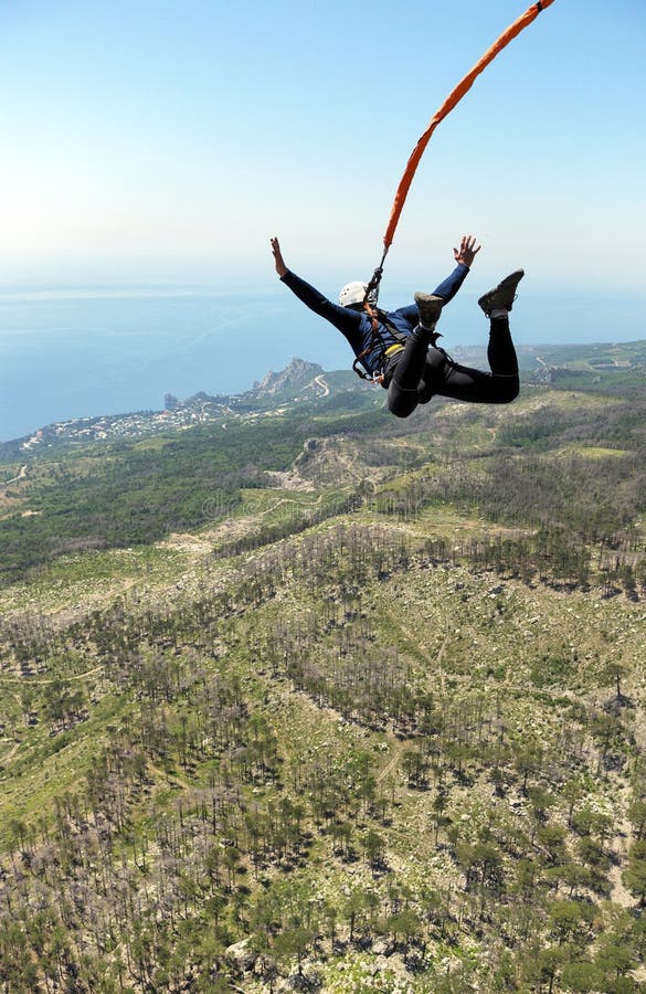 Jump off the cliff. stock image. Image of freedom, bungee - 74371691
