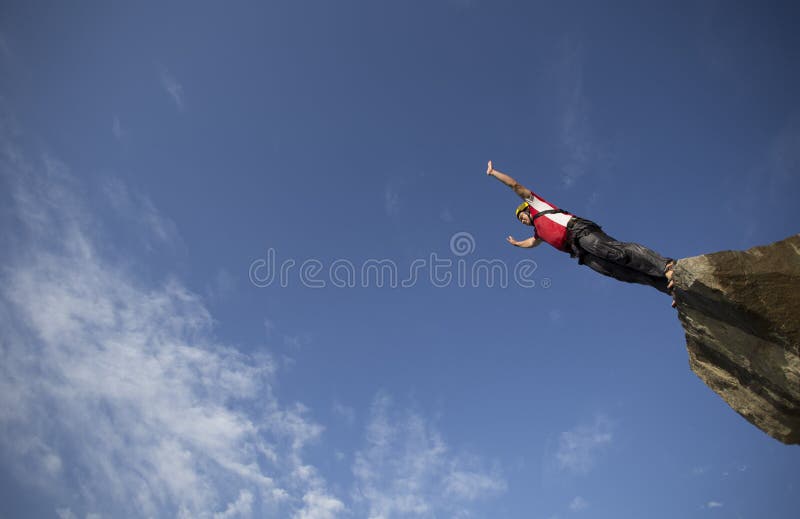 Jump off a cliff. stock image. Image of clear, mountain - 76505111