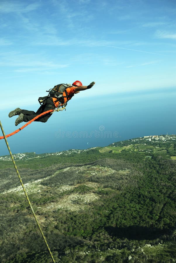 Jump Off a Cliff with a Rope.Bungee Jumping Stock Image - Image of high ...