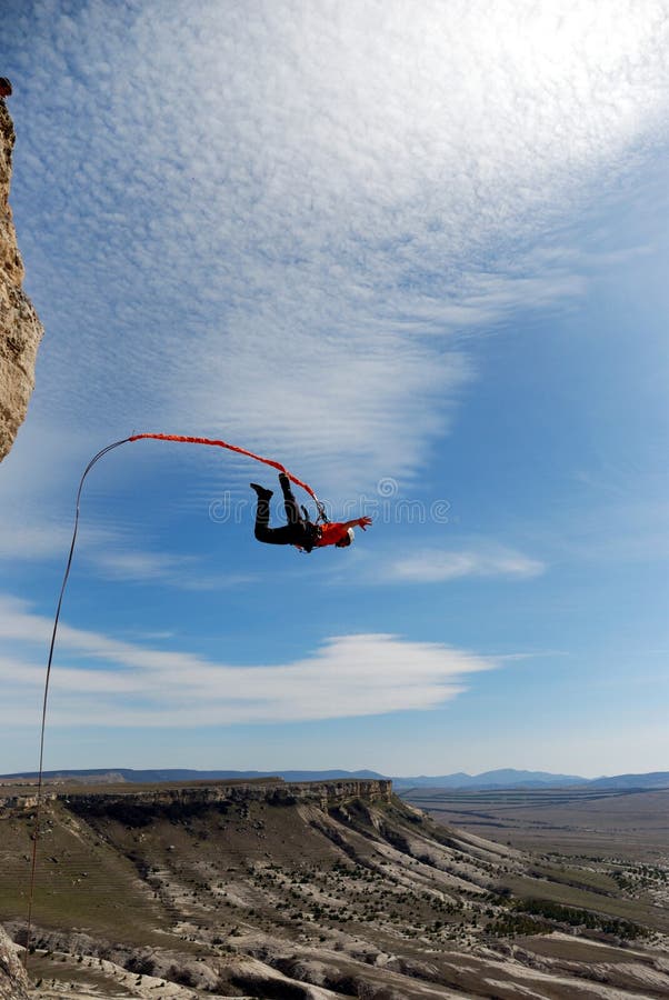 Jump Off a Cliff with a Rope.Bungee Jumping Stock Photo - Image of fall ...