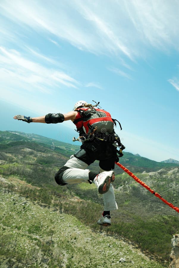 Jump Off a Cliff with a Rope.Bungee Jumping Stock Image - Image of ...