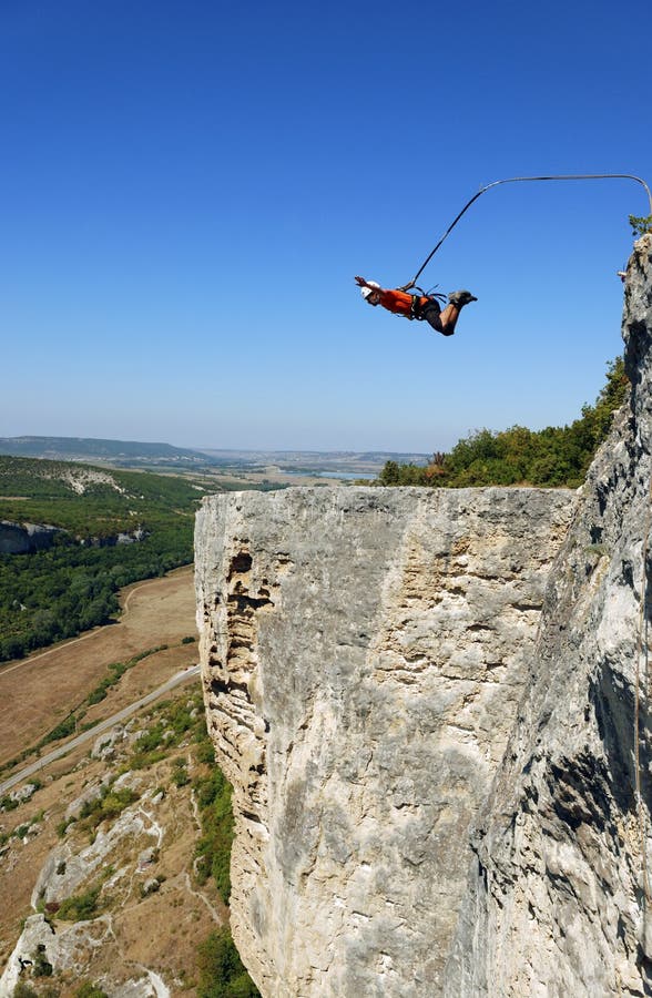 Jump Off Cliff Stock Images - Download 760 Royalty Free Photos