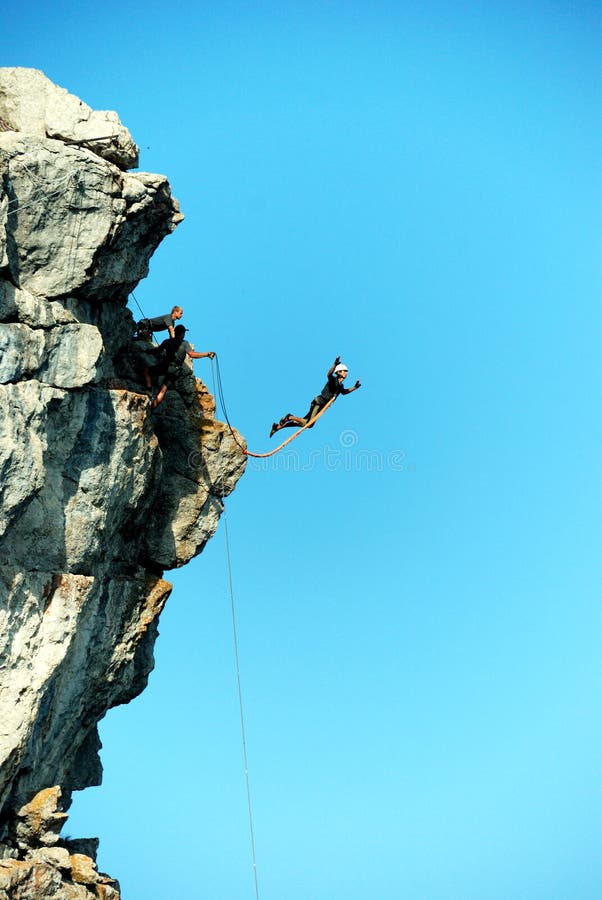 Jump Off a Cliff with a Rope.Bungee Jumping Stock Image - Image of ...