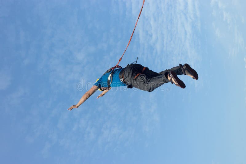 Jump Off the Cliff with a Rope. Stock Image - Image of excitement ...