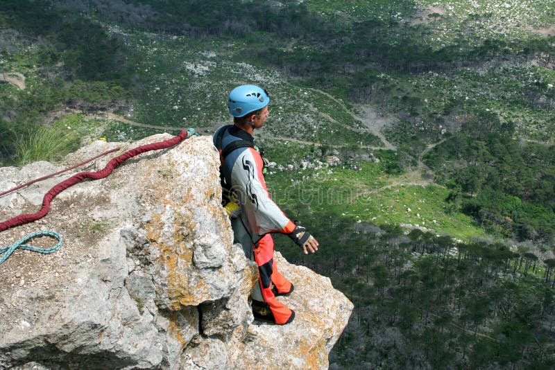 Jump Off a Cliff with a Rope. Stock Photo - Image of color, excitement ...