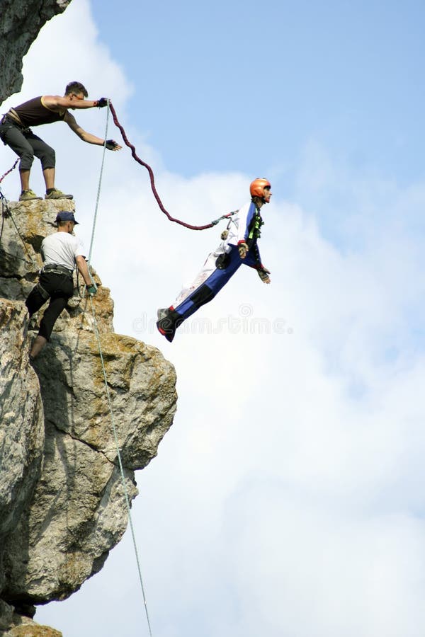 Jump Off a Cliff with a Rope. Stock Image - Image of falling, freedom ...