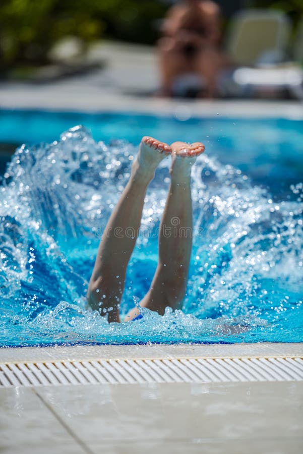 Jump in water in the pool stock photo. Image of ocean - 164466968