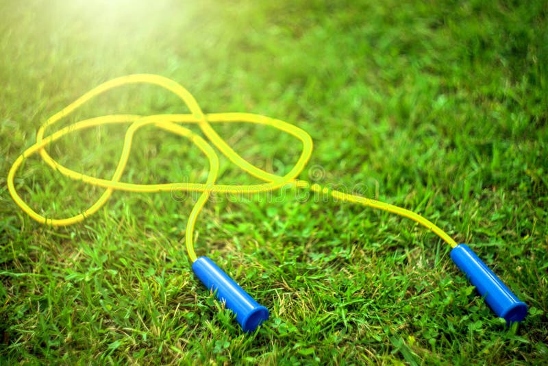 Jump Rope on a Green Summer Background Stock Image - Image of game ...