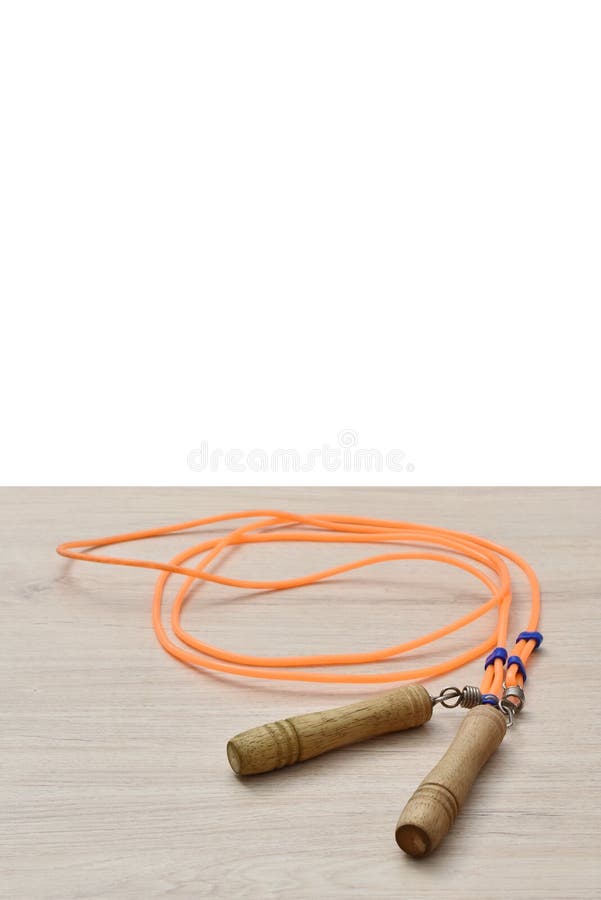 The jump rope on the table stock photo. Image of shape - 224779480