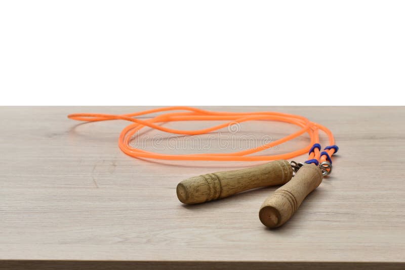 The jump rope on the table stock photo. Image of rope - 224779496