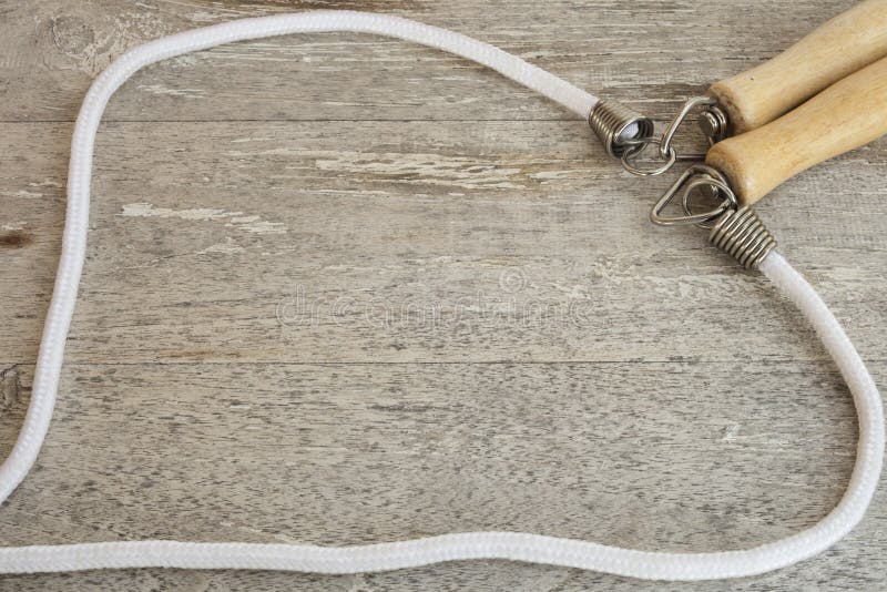 Jump Rope on a Wooden Table Stock Photo - Image of jump, green: 77087206