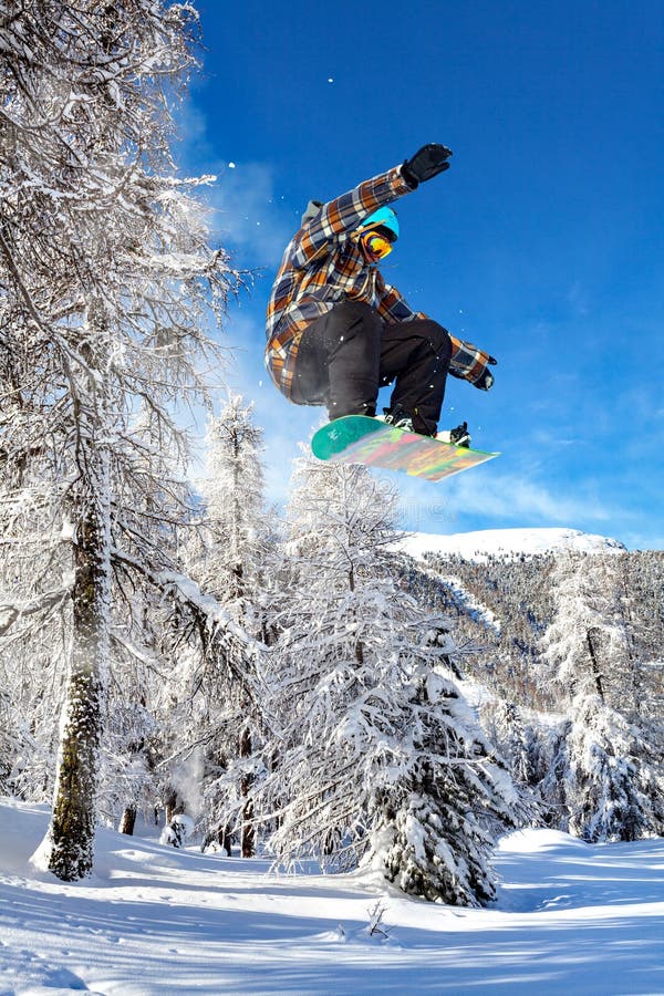 Trick in fresh snow stock photo. Image of snowboarding - 167174060