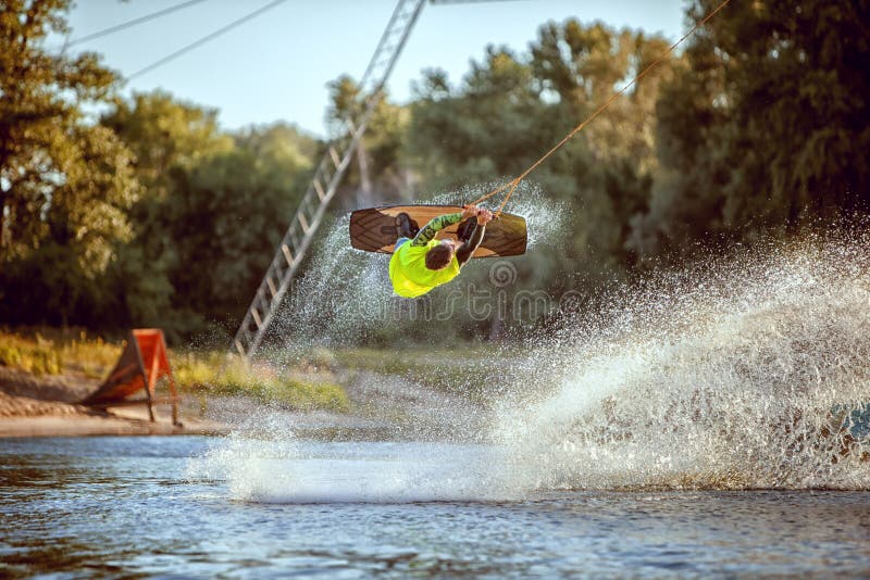 In the Jump Sportsman Wakeboarder. Stock Photo - Image of athlete ...