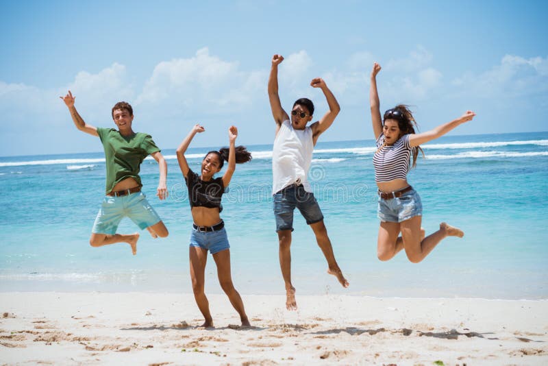 Jump To the Air Together Pose Stock Photo - Image of beautiful, pants ...