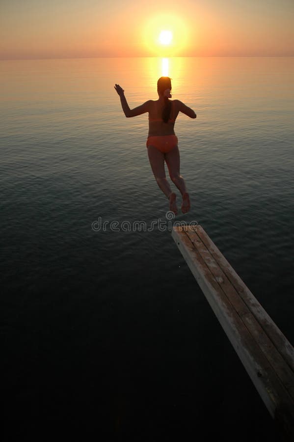 Jump to freedom stock image. Image of ocean, coast, swimming - 1037721