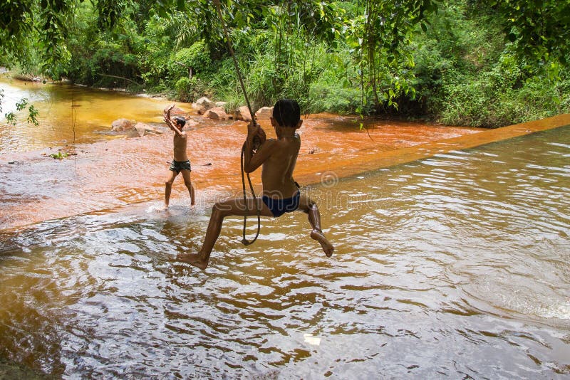 Jump into the water editorial photo. Image of children - 58828176