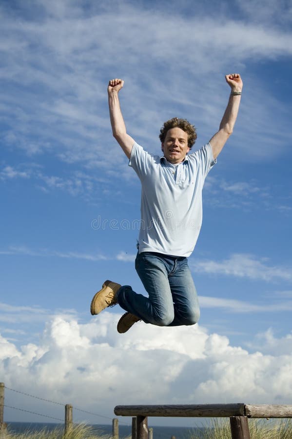 Man Jumping stock photo. Image of hands, action, happy - 645446