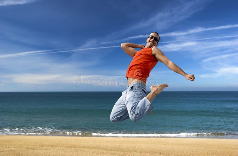 Jumping on the beach stock photo. Image of jumping, adult - 13465654