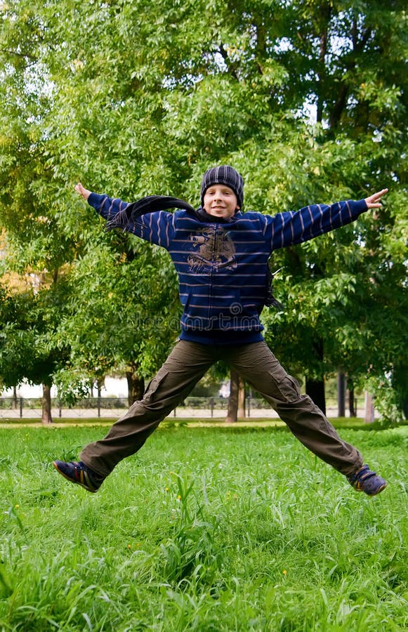 Jumping Boy stock image. Image of cute, head, freedom - 11023085