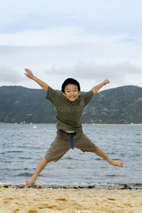 Jumping boy stock photo. Image of happy, smile, laughter - 1390316