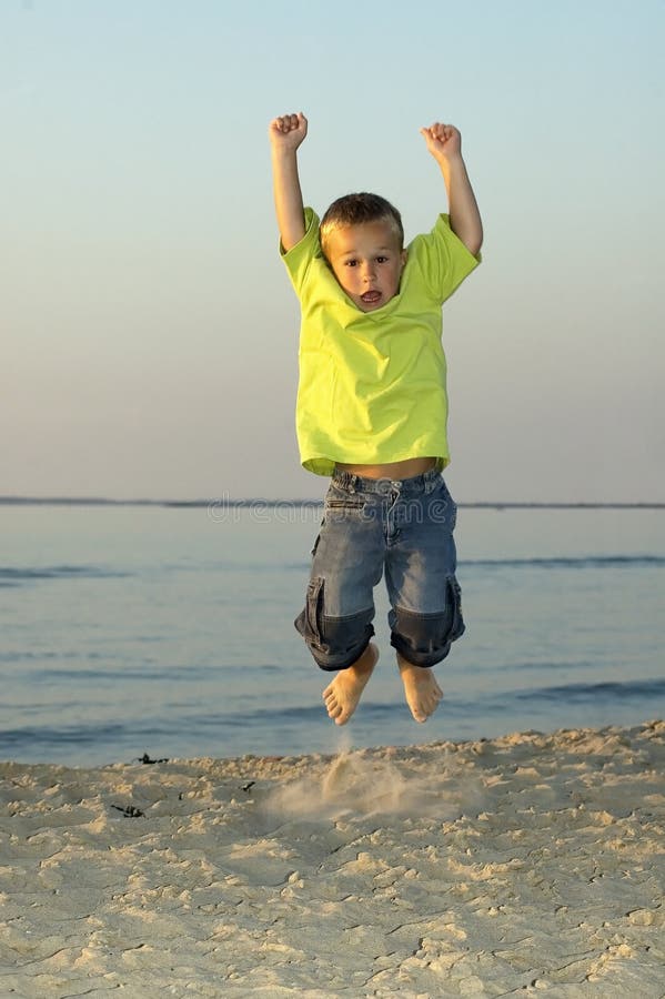 Jumping Boy stock image. Image of jump, beach, smile, childhood - 3172997