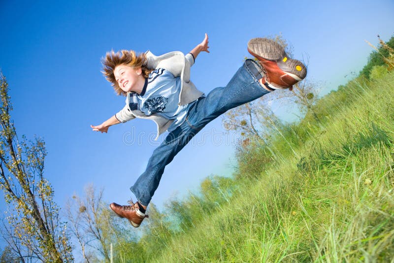 Jumping boy stock photo. Image of dancing, playing, outdoors - 8538192
