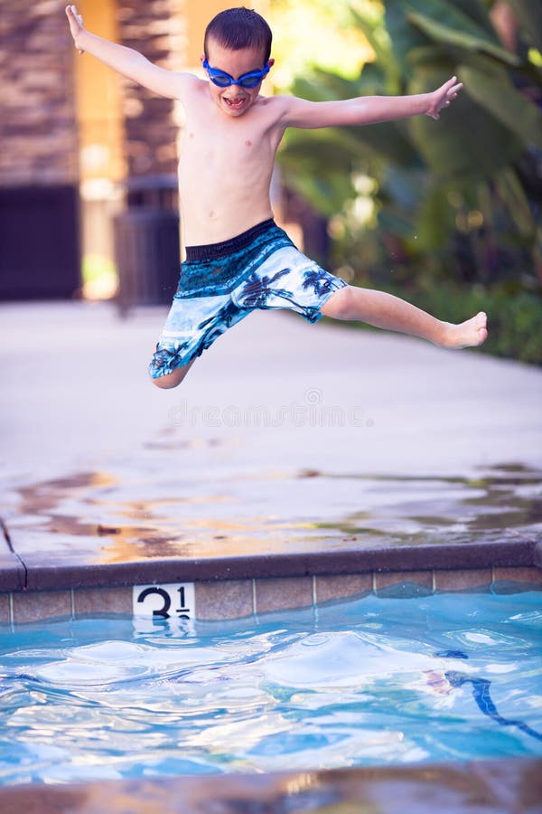 Jumping Boy in the Air, Heading into the Pool Stock Image - Image of ...