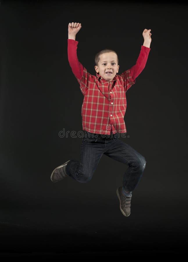 Jumping Boy on Black Background Stock Photo - Image of jump, play: 28078114
