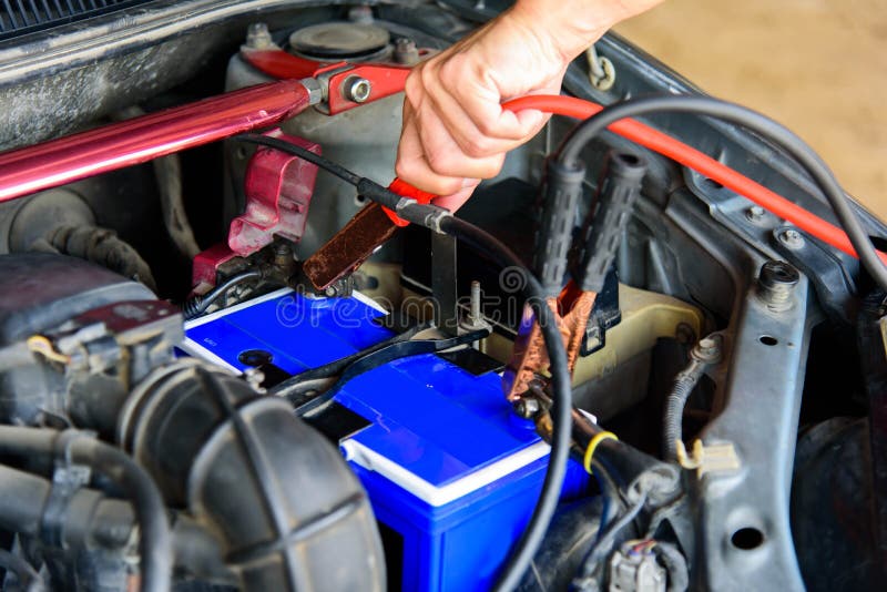 Charging Car Battery for Start Engine Stock Image - Image of batteries ...