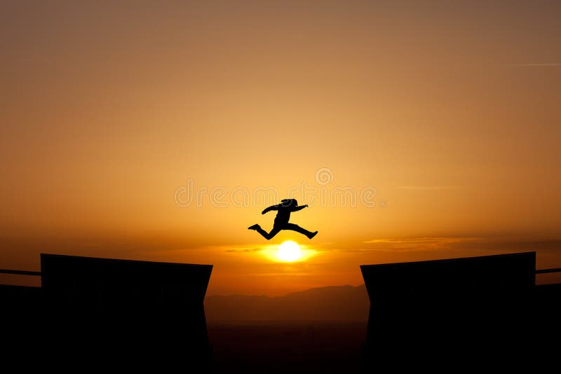 Jumping a gap in sunset stock photo. Image of fall, nature - 28107158