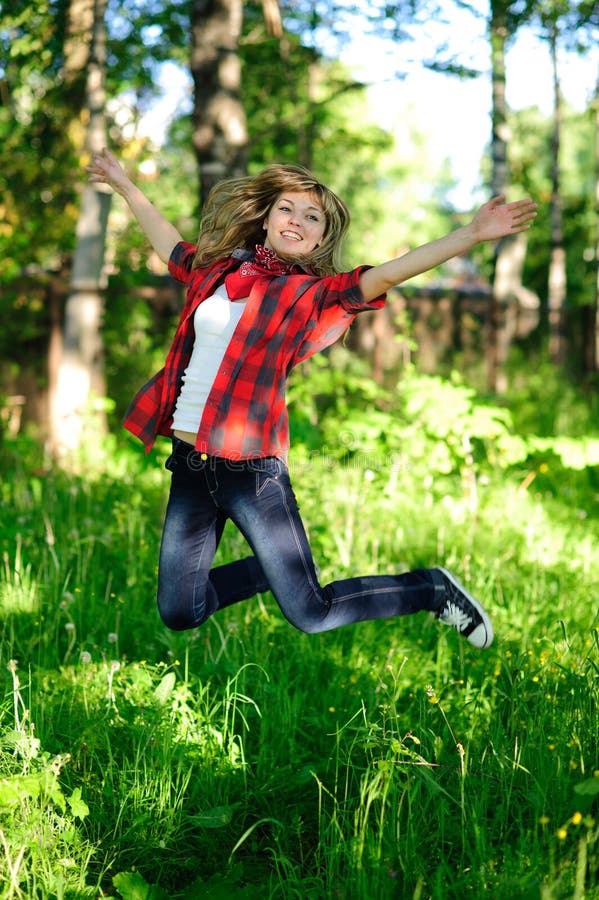 Jumping girl stock photo. Image of freestyle, jeans, jump - 22507296