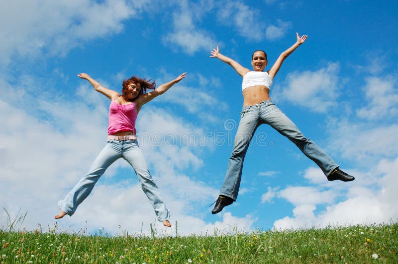 Jumping girls stock photo. Image of peace, flying, happy - 2959134