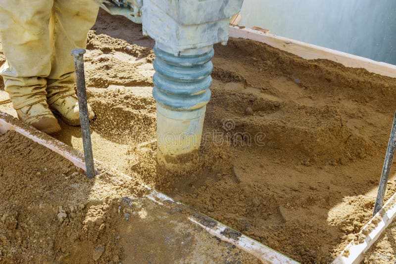 Jumping Hammer Vibratory on Sand Ground at Construction Process in the ...