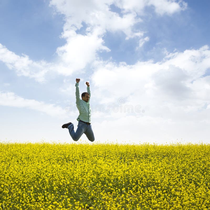 Jumping Happy Young Man stock photo. Image of healthy - 137670654