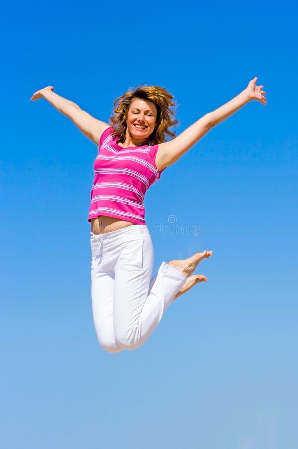 Jumping in joy stock photo. Image of smile, enjoyment - 5566088