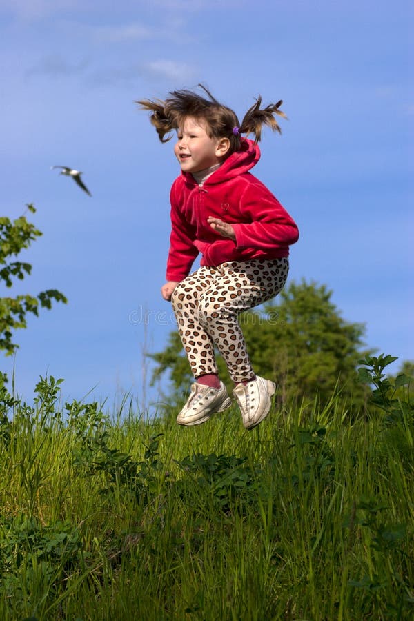 Girl jumping stock photo. Image of action, real, little - 15052112