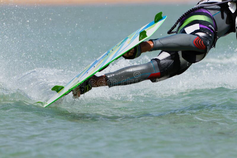 Jumping kitesurfer stock image. Image of surfboard, kite - 23735315