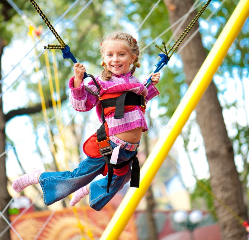 Jumping littele girl stock image. Image of cheerful, adventure - 26961101