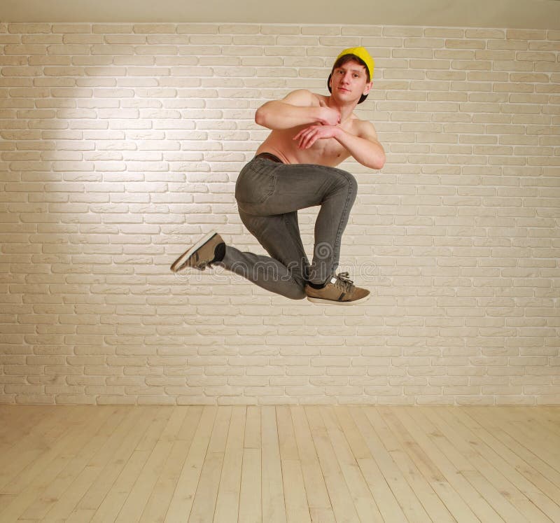 Jumping Man in Flight Guy in Breakdance Style Training Workout in ...