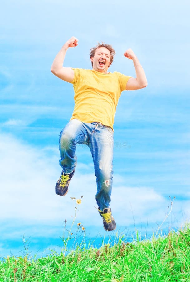 Jumping over the grass stock image. Image of active, colorful - 8184583