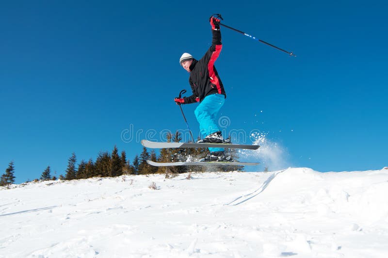 Jumping Over the Kicker with Skies Stock Image - Image of jump, jacket ...