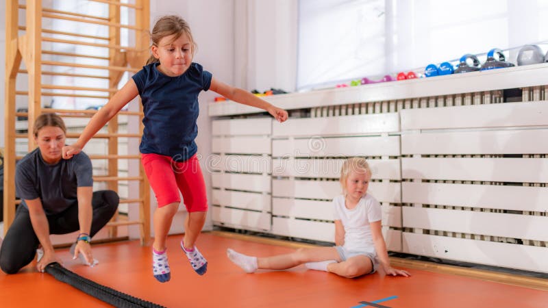 Jumping Over Rope in a Physical Activity Class Stock Image - Image of ...
