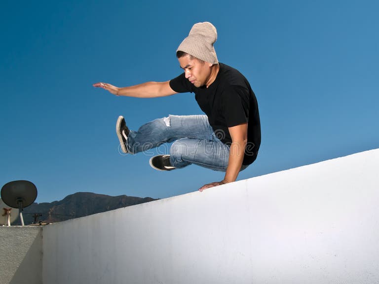 2,354 Jumping Over Wall Stock Photos - Free & Royalty-Free Stock Photos ...
