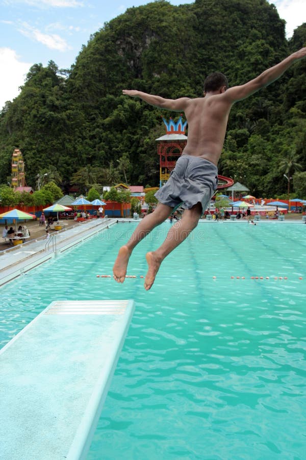 Jumping in the pool stock image. Image of motion, mountain - 8513167