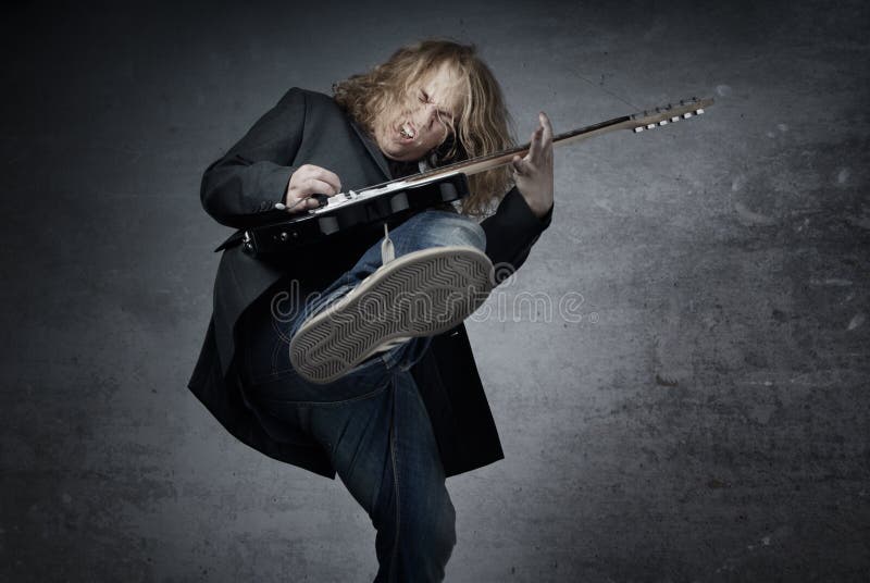 Jumping rock guitarist stock photo. Image of action, metal - 7465836