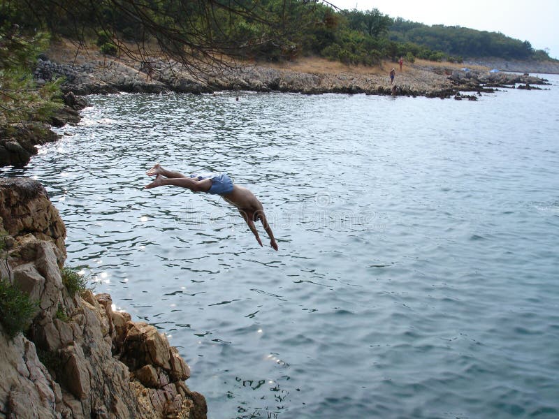 Jumping in sea stock image. Image of excited, beach, croatia - 1040527