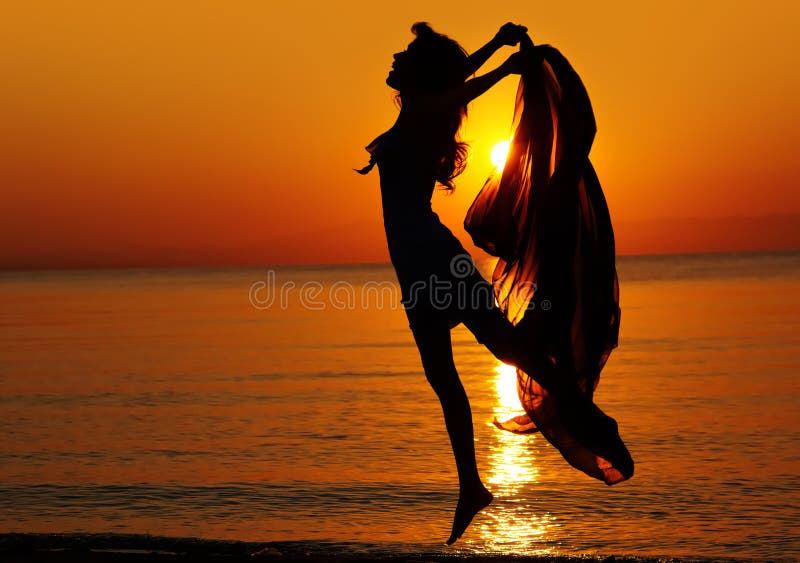 Jumping at sunset stock photo. Image of freshness, relaxation - 16064556