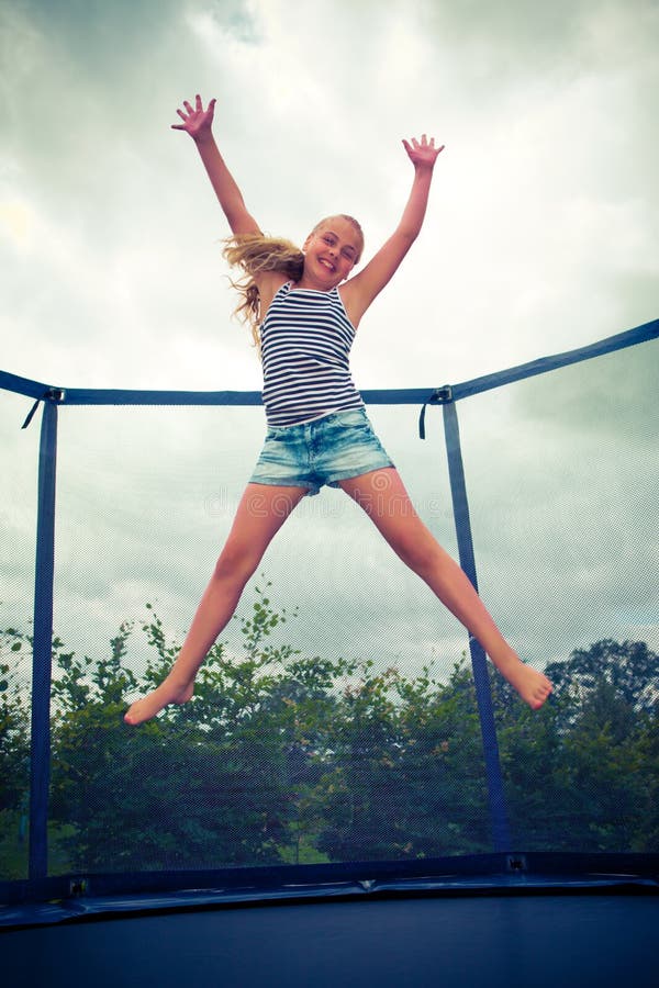 Jumping on a trampoline stock photo. Image of excitement - 74374932 Jumping on a trampoline stock photo. Image of excitement - 74374932